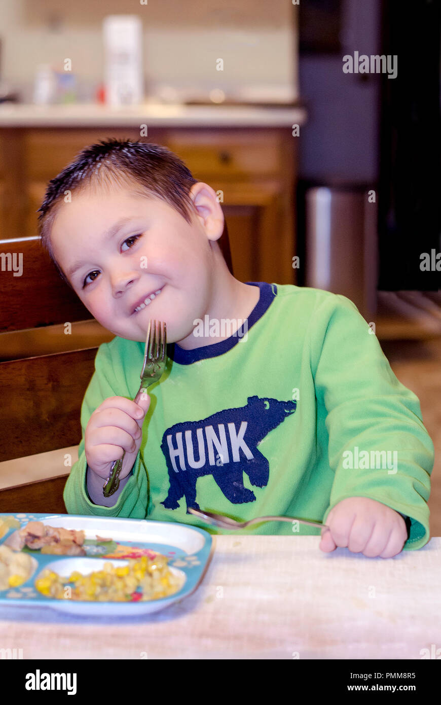Child eating healthy dinner hi-res stock photography and images - Alamy