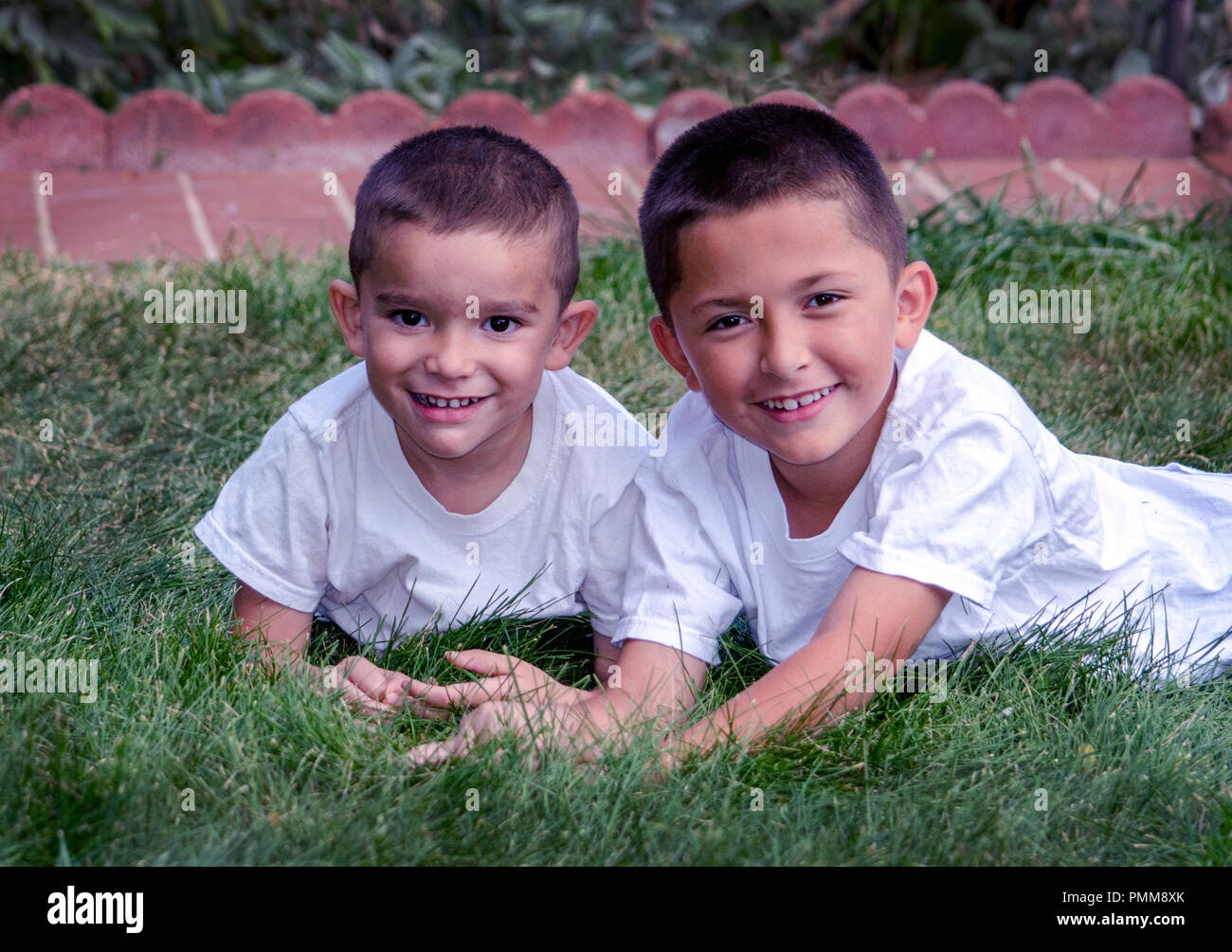 portrait of two smiling brothers Stock Photo - Alamy