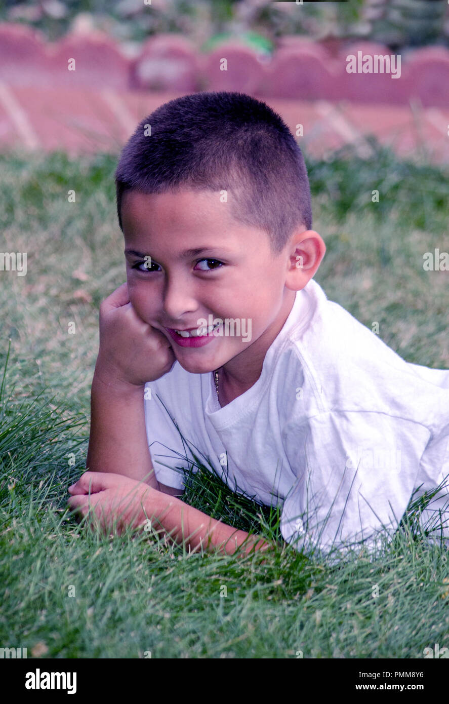 Young latino boy smiling hi-res stock photography and images - Alamy