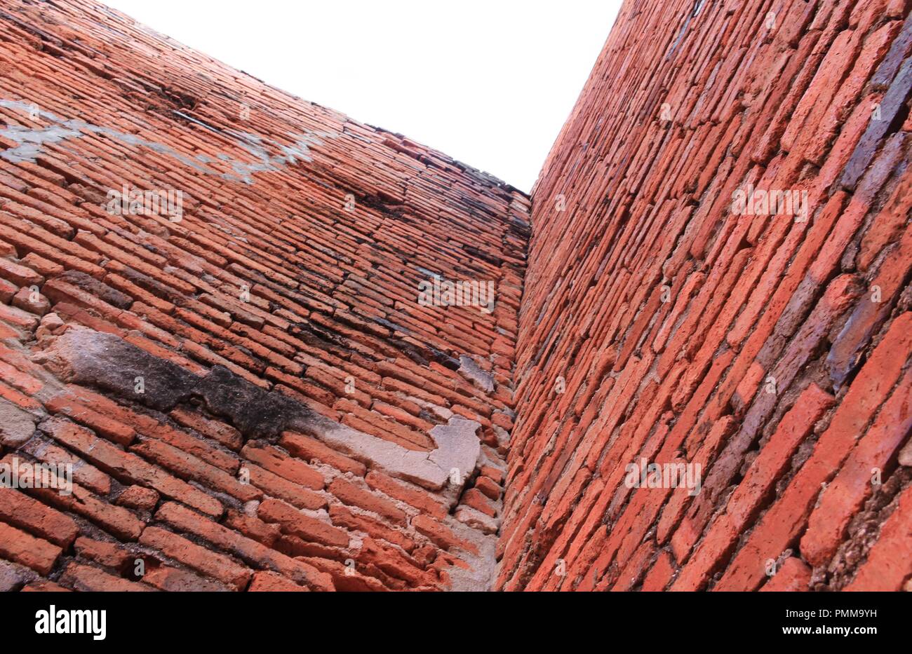 brick fortress wall ancient on blue sky Stock Photo - Alamy