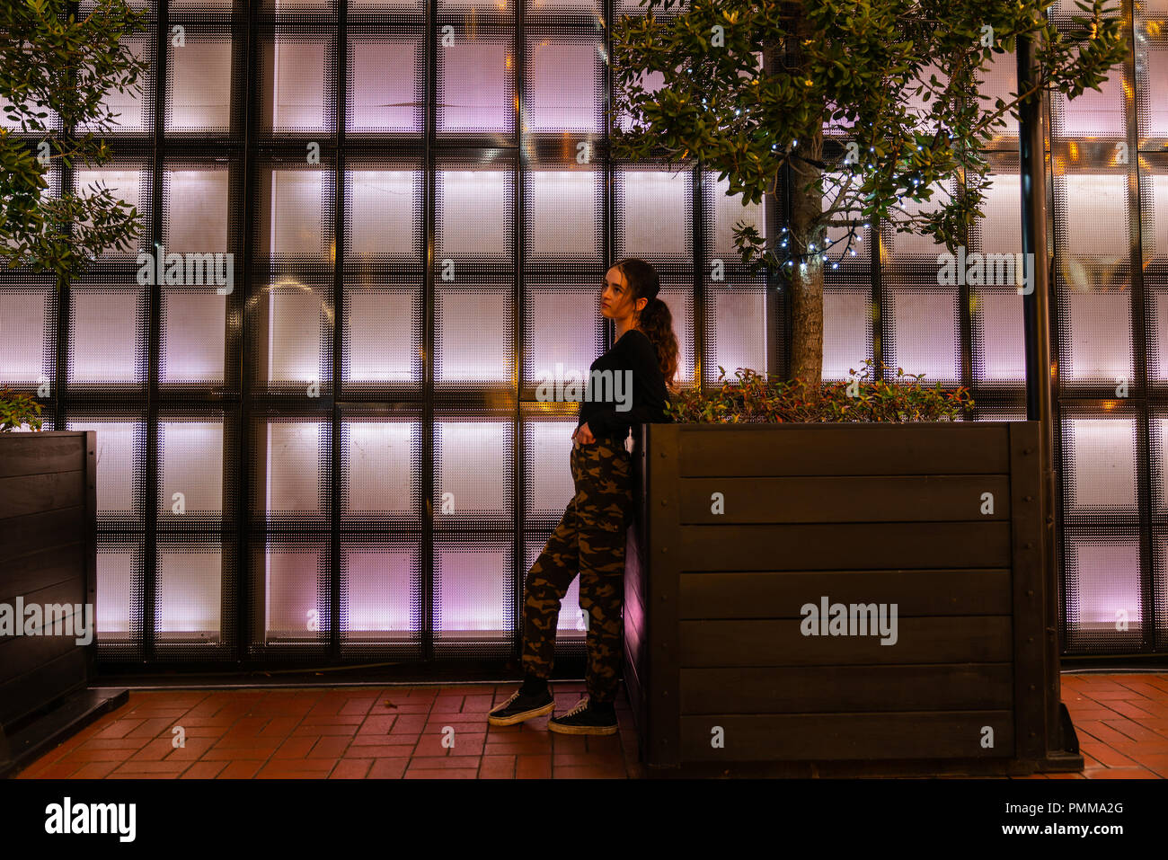 Girl looking back night hi-res stock photography and images - Alamy