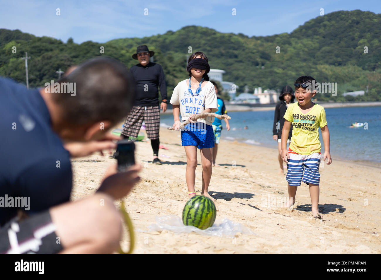 Watermelon Splitting Game Stock Photo - Alamy