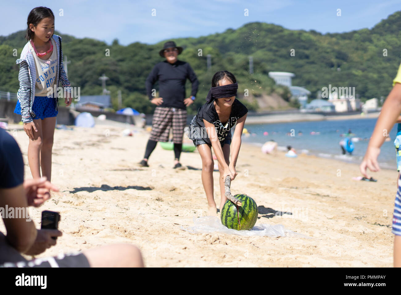 Watermelon Splitting Game Stock Photo - Alamy