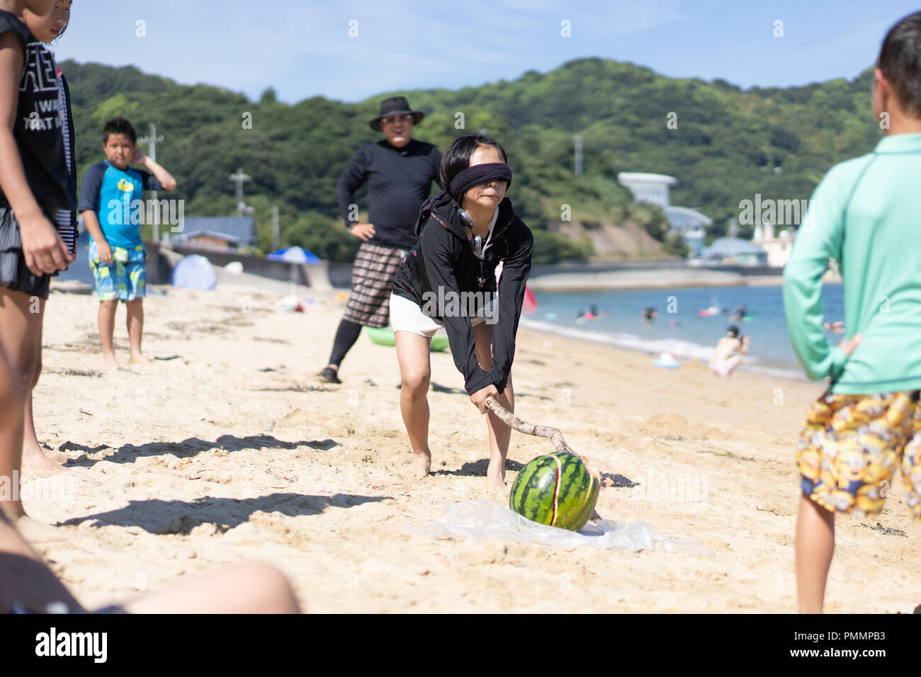 Watermelon Splitting Game Stock Photo - Alamy