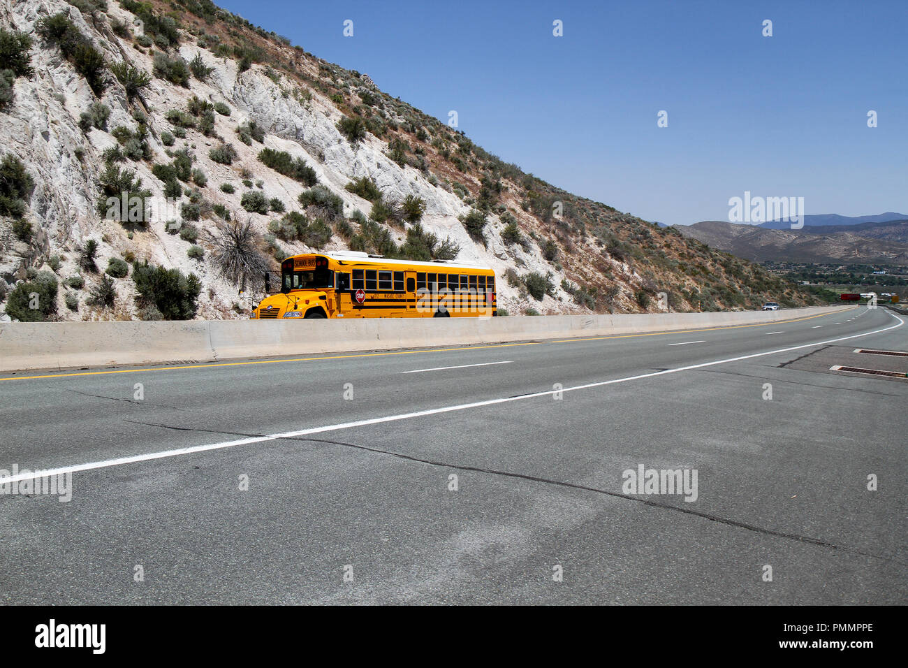 School bus on the road mear Carson City, Nevada, United States Stock ...