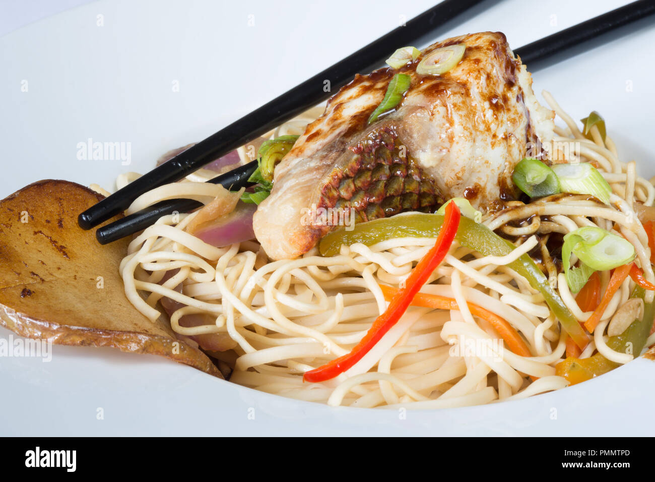 Middle eastern style dish of pan fried Red Snapper with stir fried ...