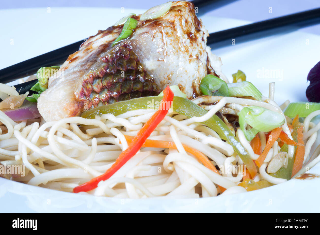 Middle eastern style dish of pan fried Red Snapper with stir fried ...