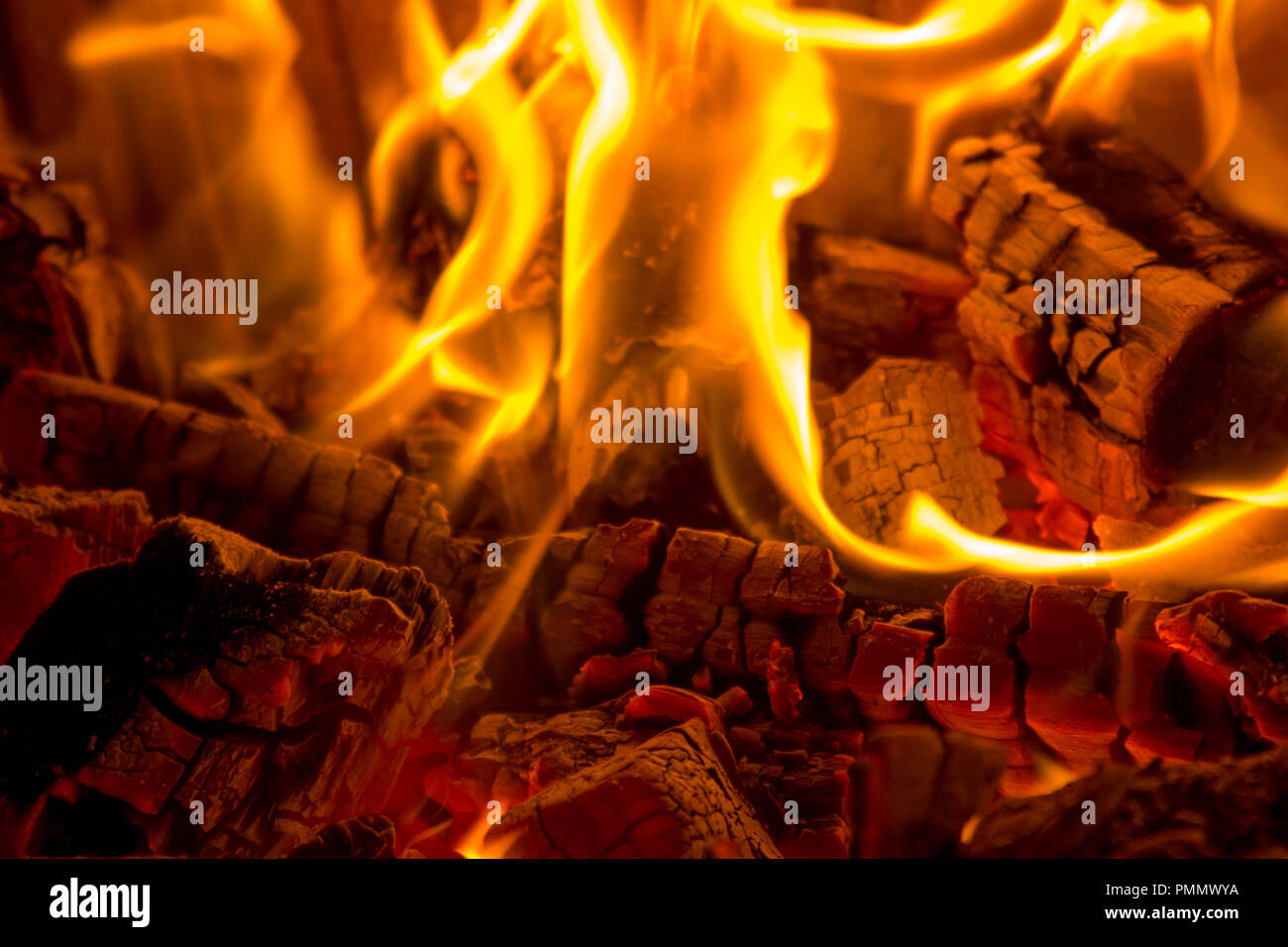 Burning close-up wood coals in the fireplace Stock Photo - Alamy