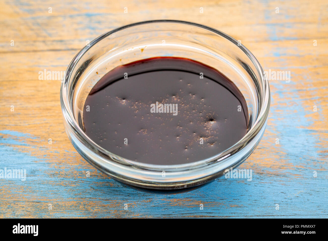 a small bowl of yacon syrup, a powerful prebiotic sweetener derived ...