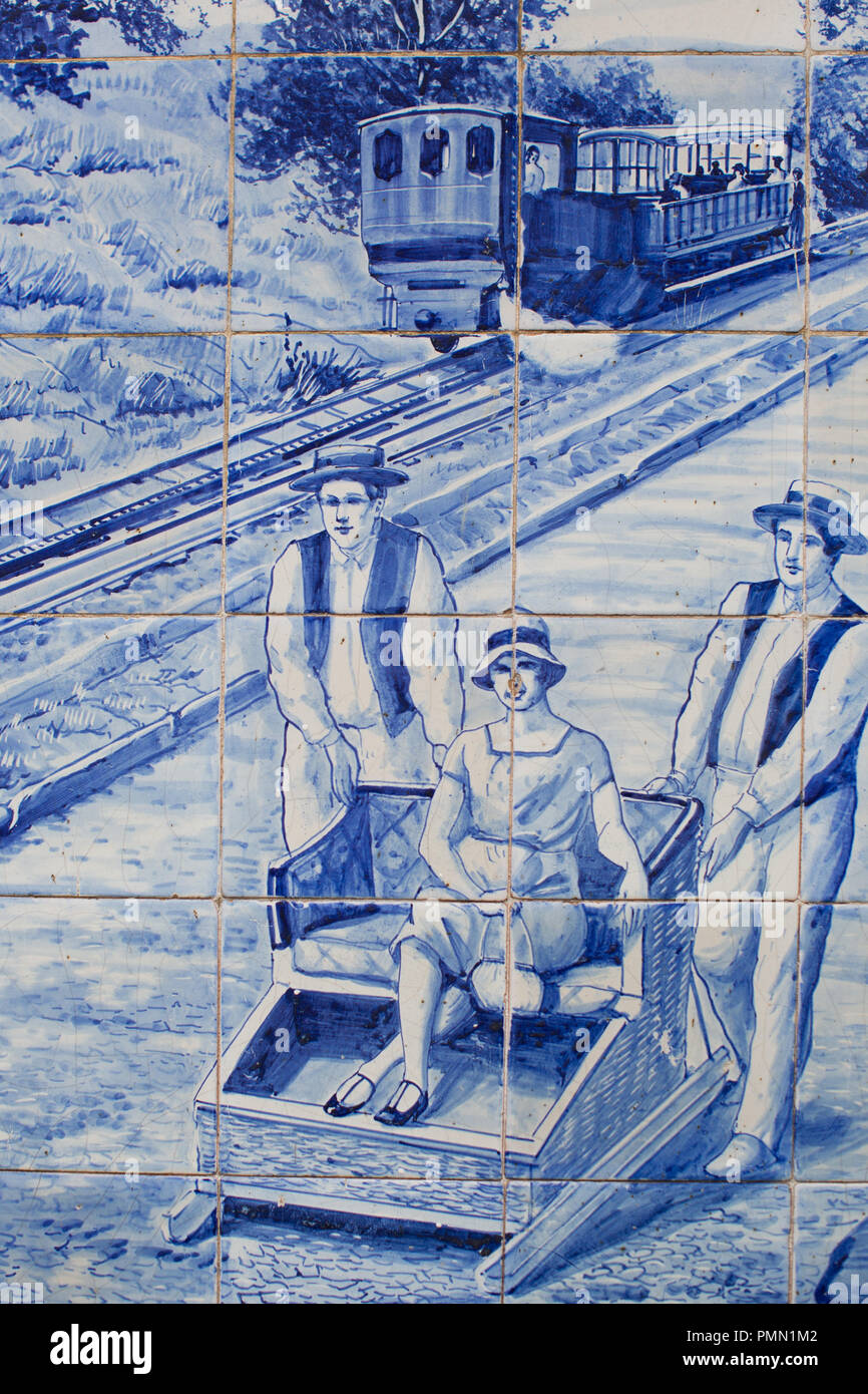 Two tone blue and white traditional hand painted ceramic tiles showing ...