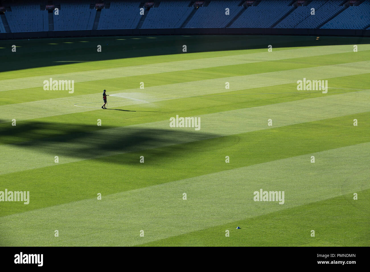 Groundskeeper watering the turf at the Melbourne Cricket Ground Stock ...