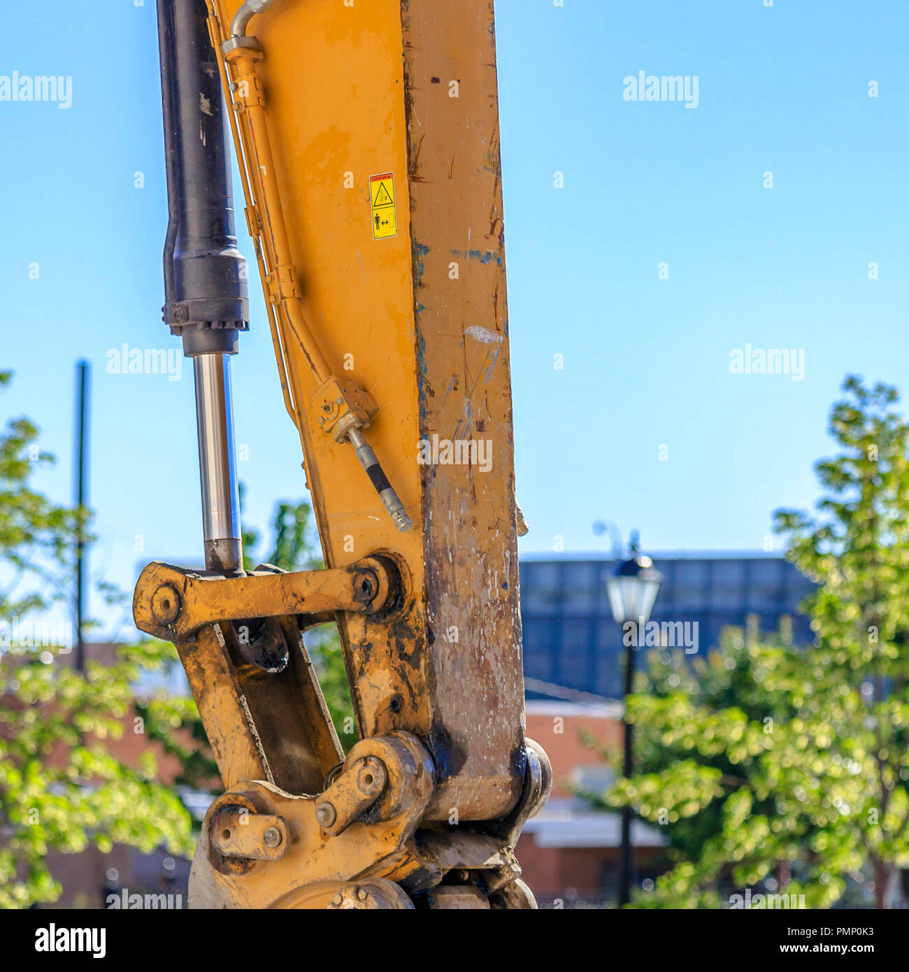 Filthy yellow arm of a construction vehicle Stock Photo - Alamy