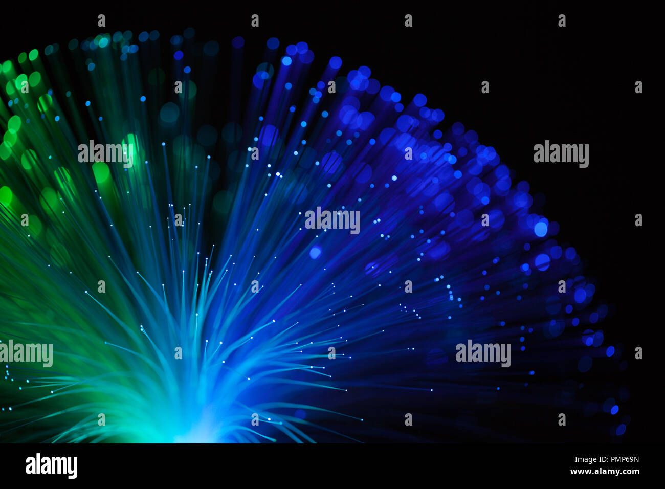 Abstract background a Optical fiber lamp. Closeup of colorful optical ...