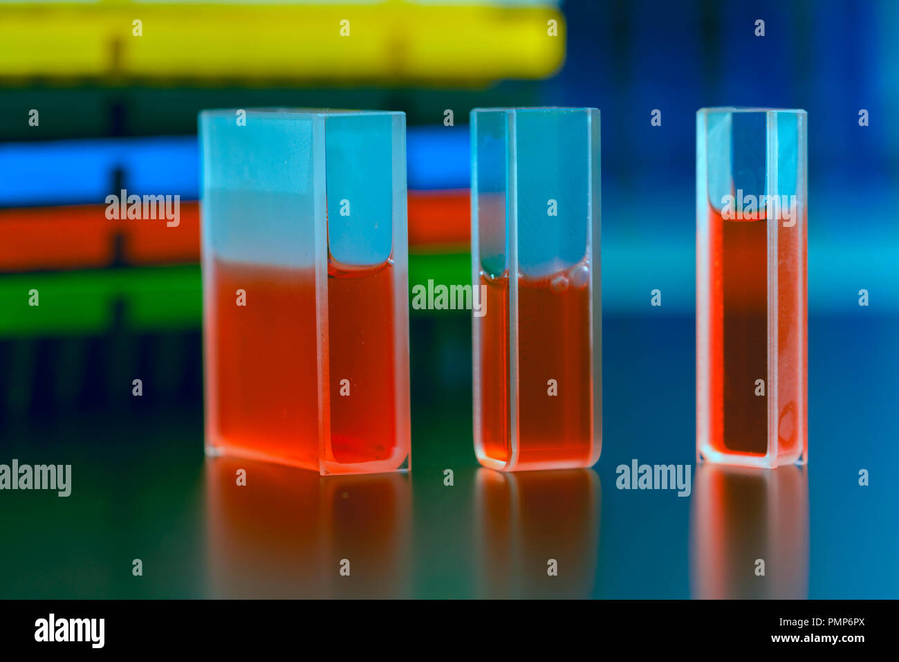 Quartz cuvette with the sample liquid for measurement Stock Photo - Alamy