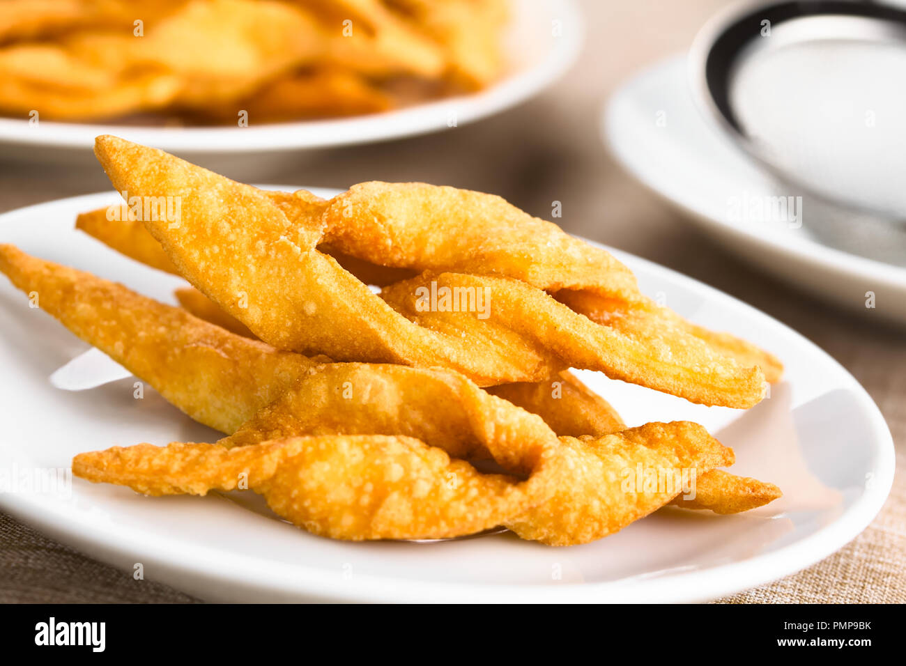 Fresh homemade crispy deep-fried angel wing or bowtie cookies ...