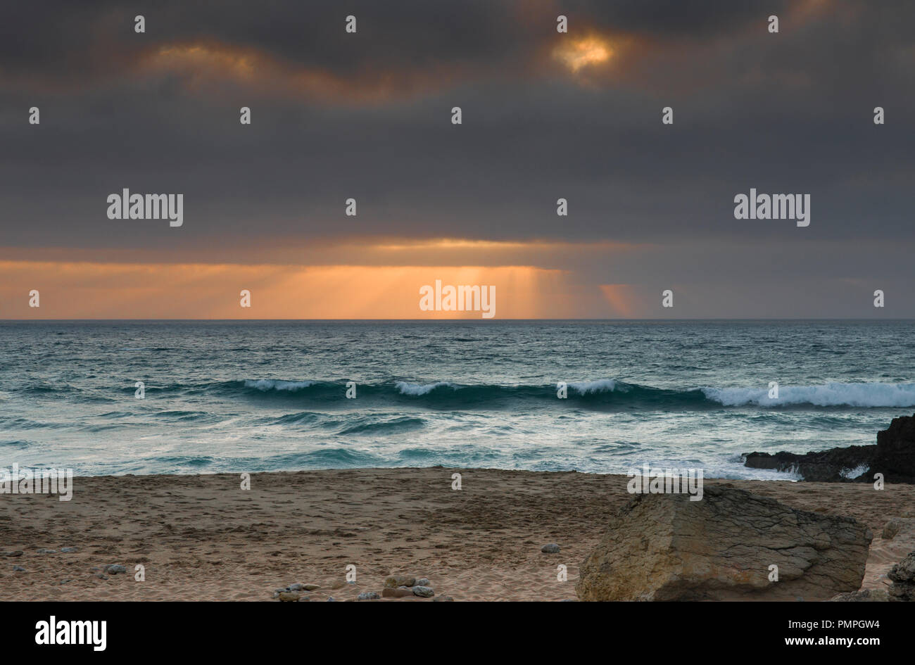 Sunset in Praia do Cresmina beach, Guincho, Cascais, Portugal Stock Photo - Alamy