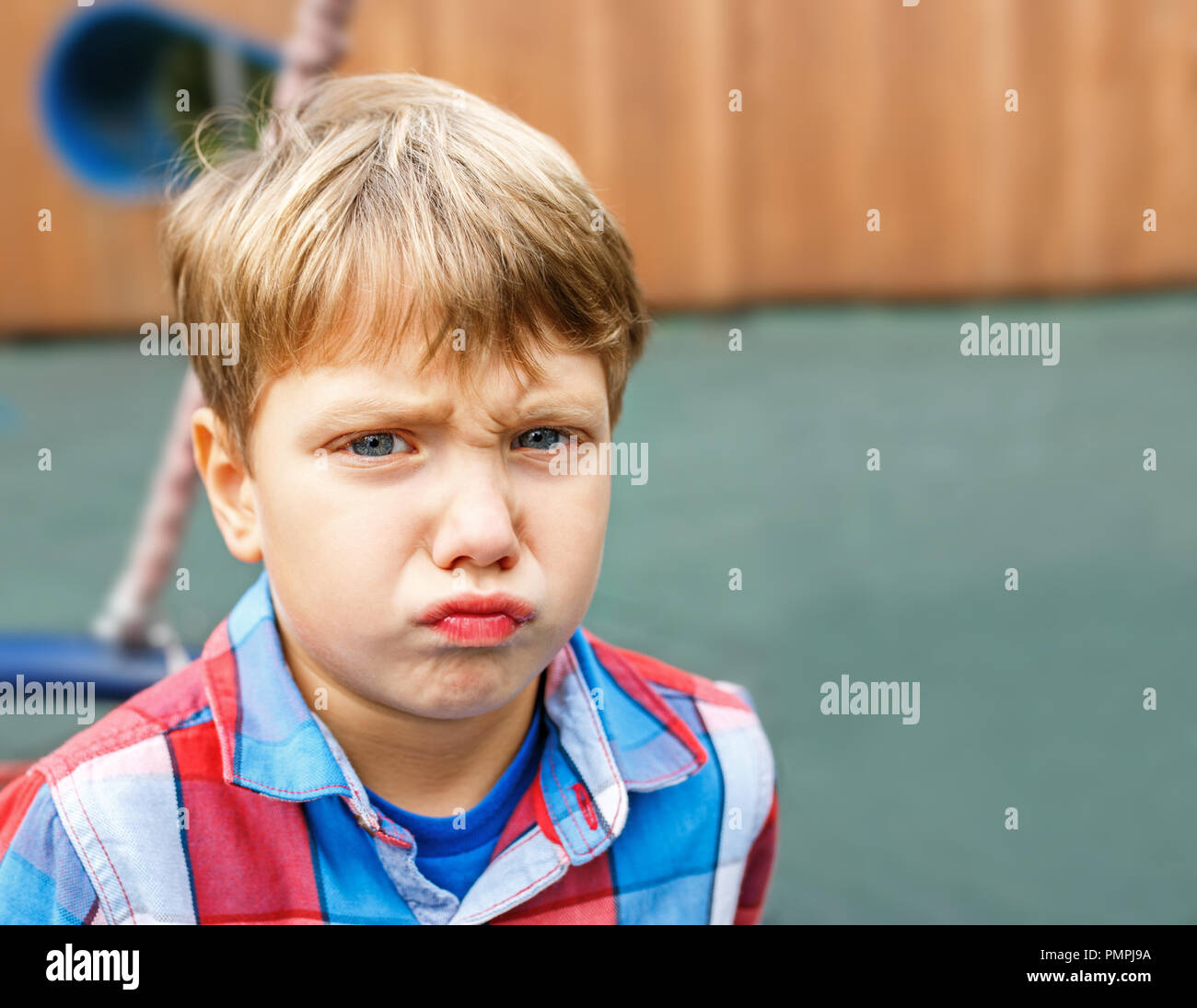 Closeup portrait of a baby boy making a funny face Stock Photo - Alamy