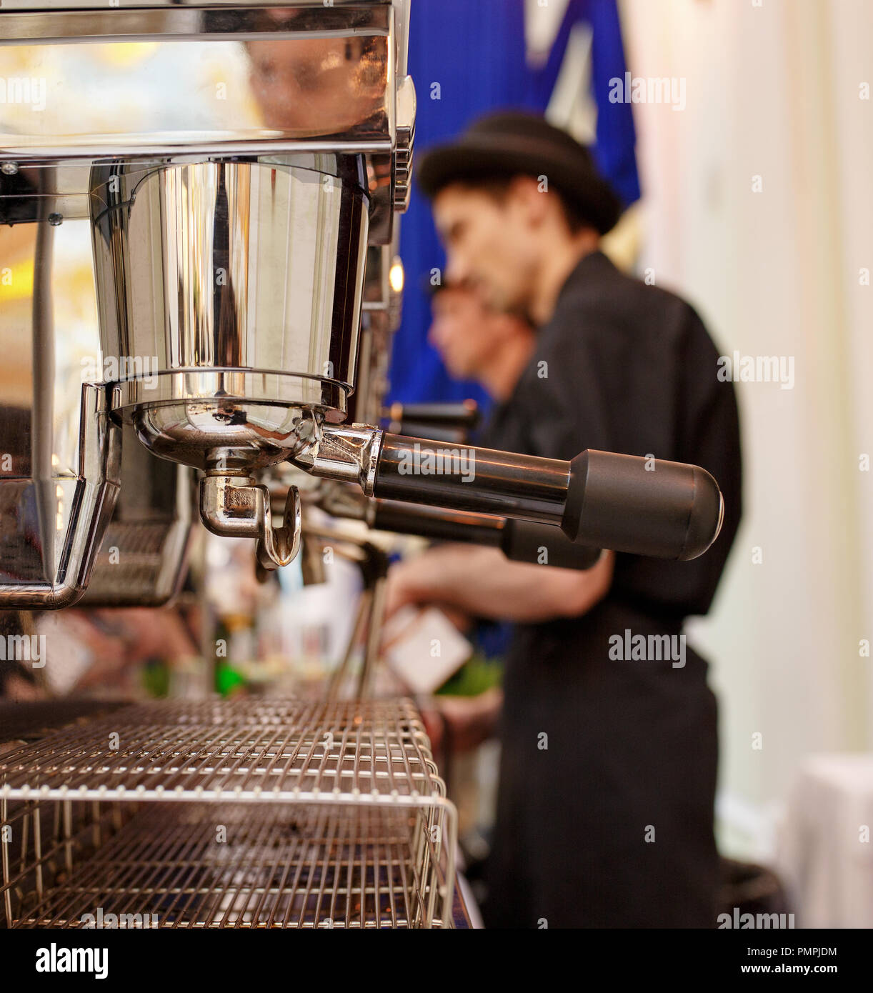 Coffee machine in the coffee shop blurred background with Baristas ...
