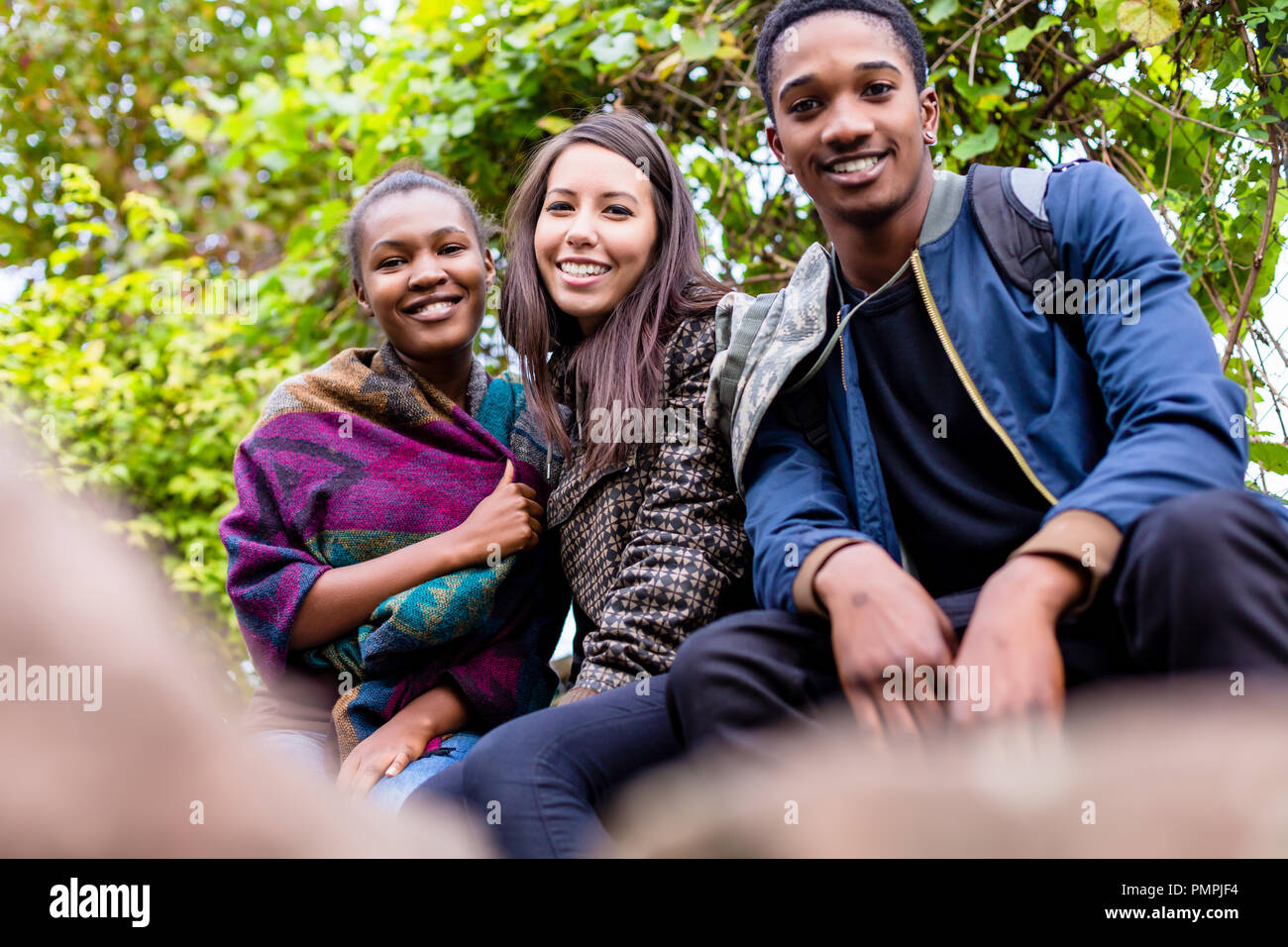 Portrait ofsmiling friends Stock Photo - Alamy