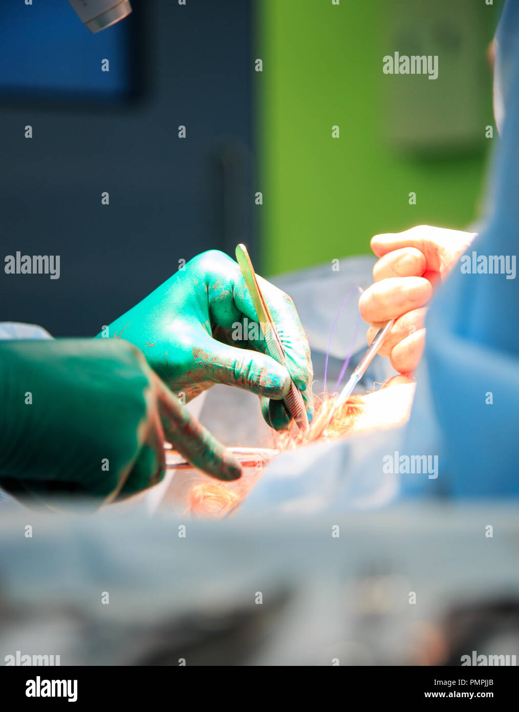 Surgery, medicine and people concept - three surgeons in operating room ...