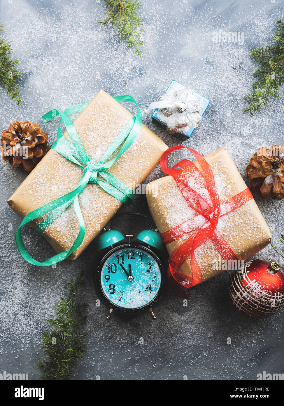 Christmas new year wrapped gifts with ribbons and snow flakes. Almost ...