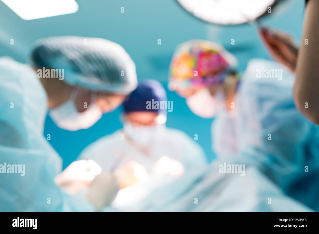 Surgery, medicine and people concept - Blurred background with surgeons ...