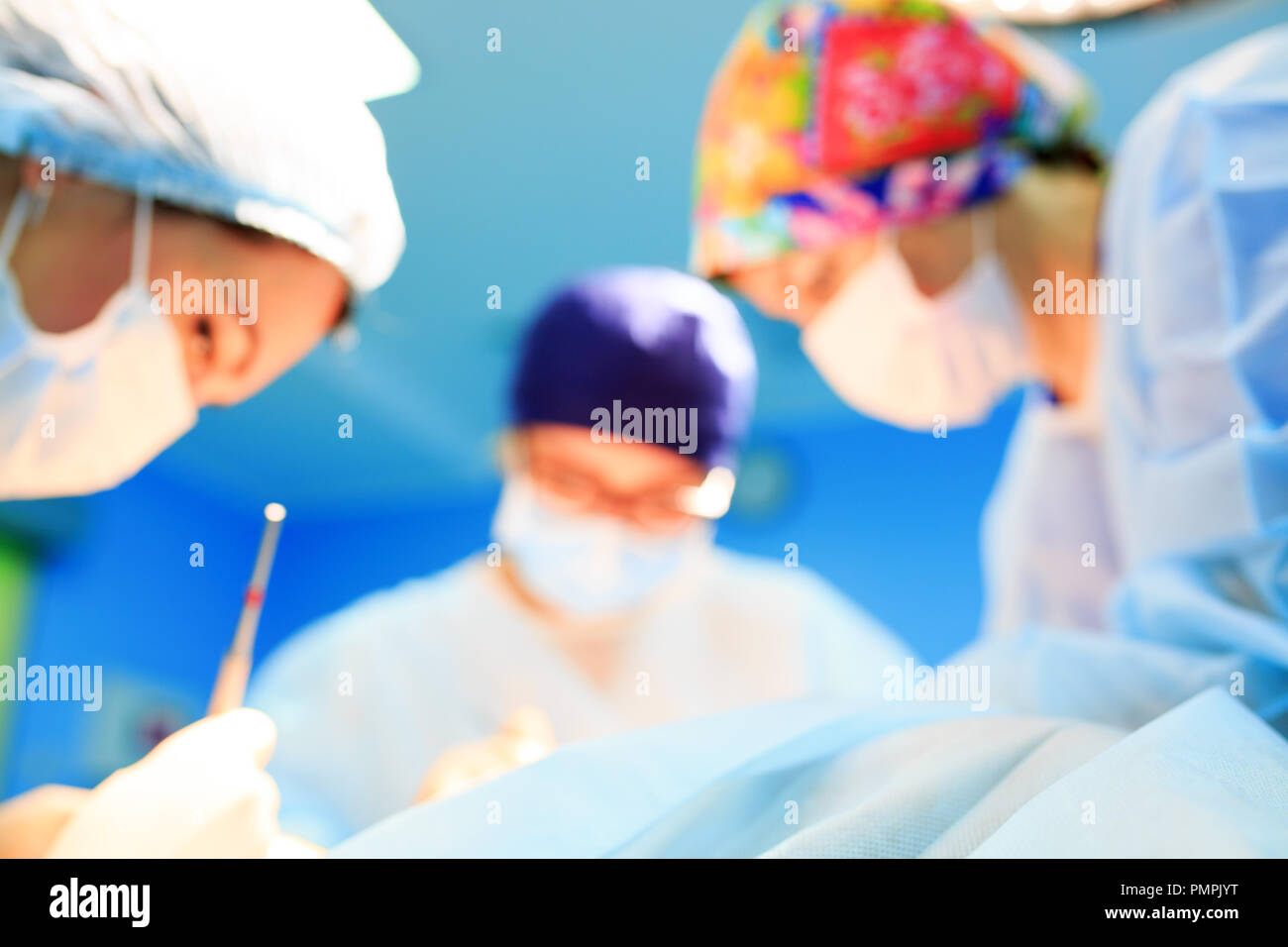 Surgery, medicine and people concept - Blurred background with surgeons ...