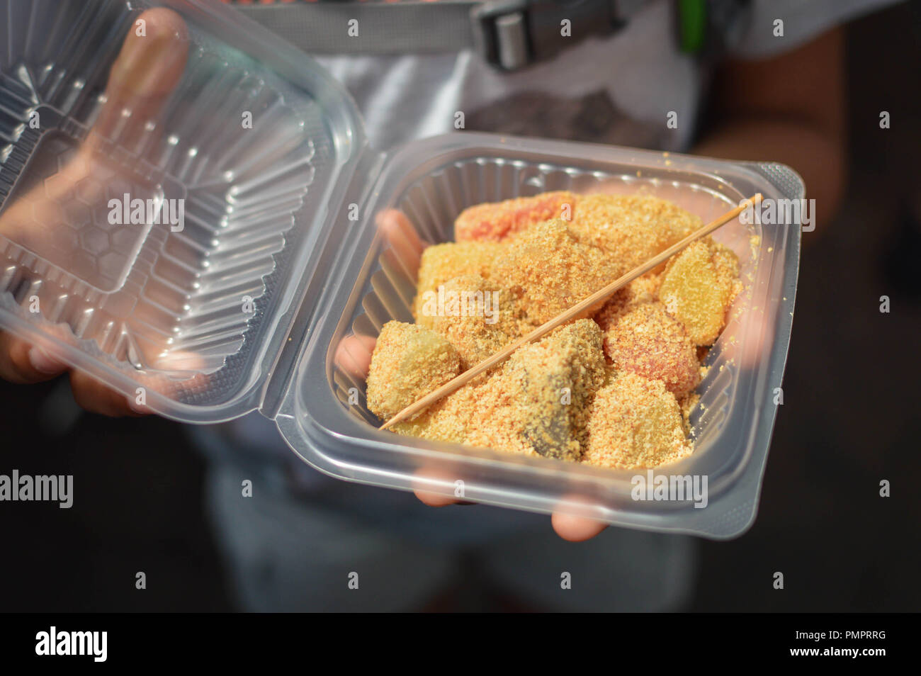 Delicious sweet mochi with peanuts sold at a street stall in Kuala ...