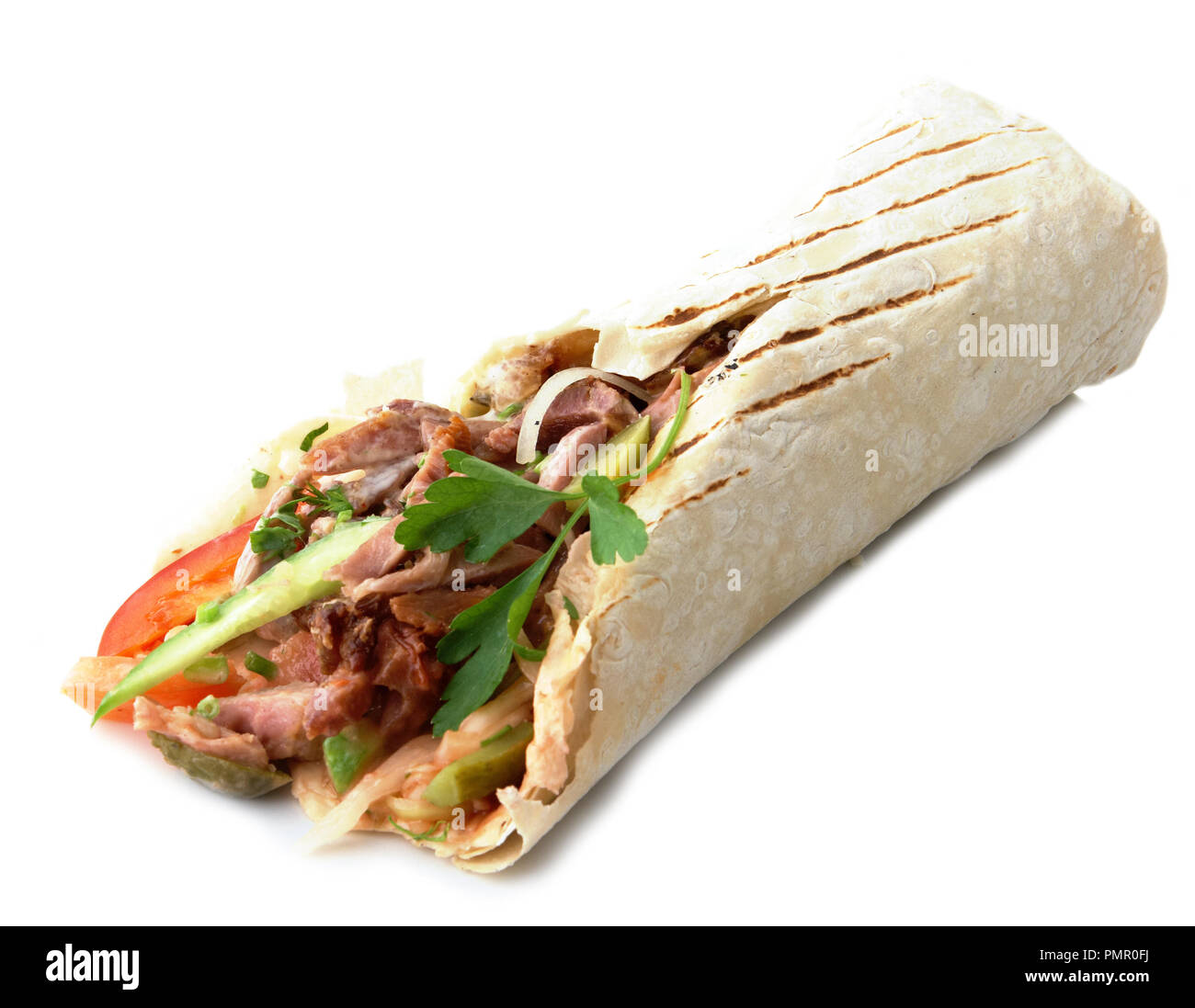 Traditional arabic shawarma with vegetables and spices isolated on ...