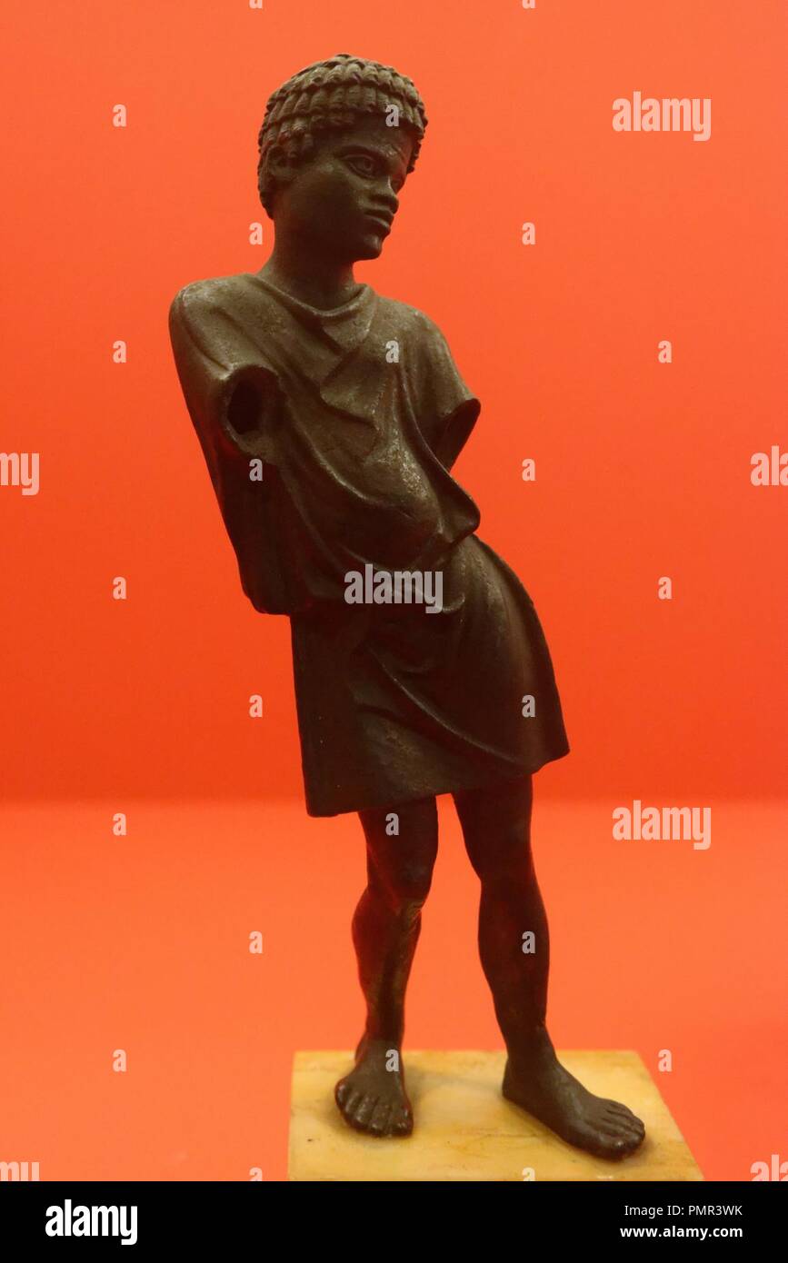 Black young man CdM Bronze 1010 Stock Photo - Alamy