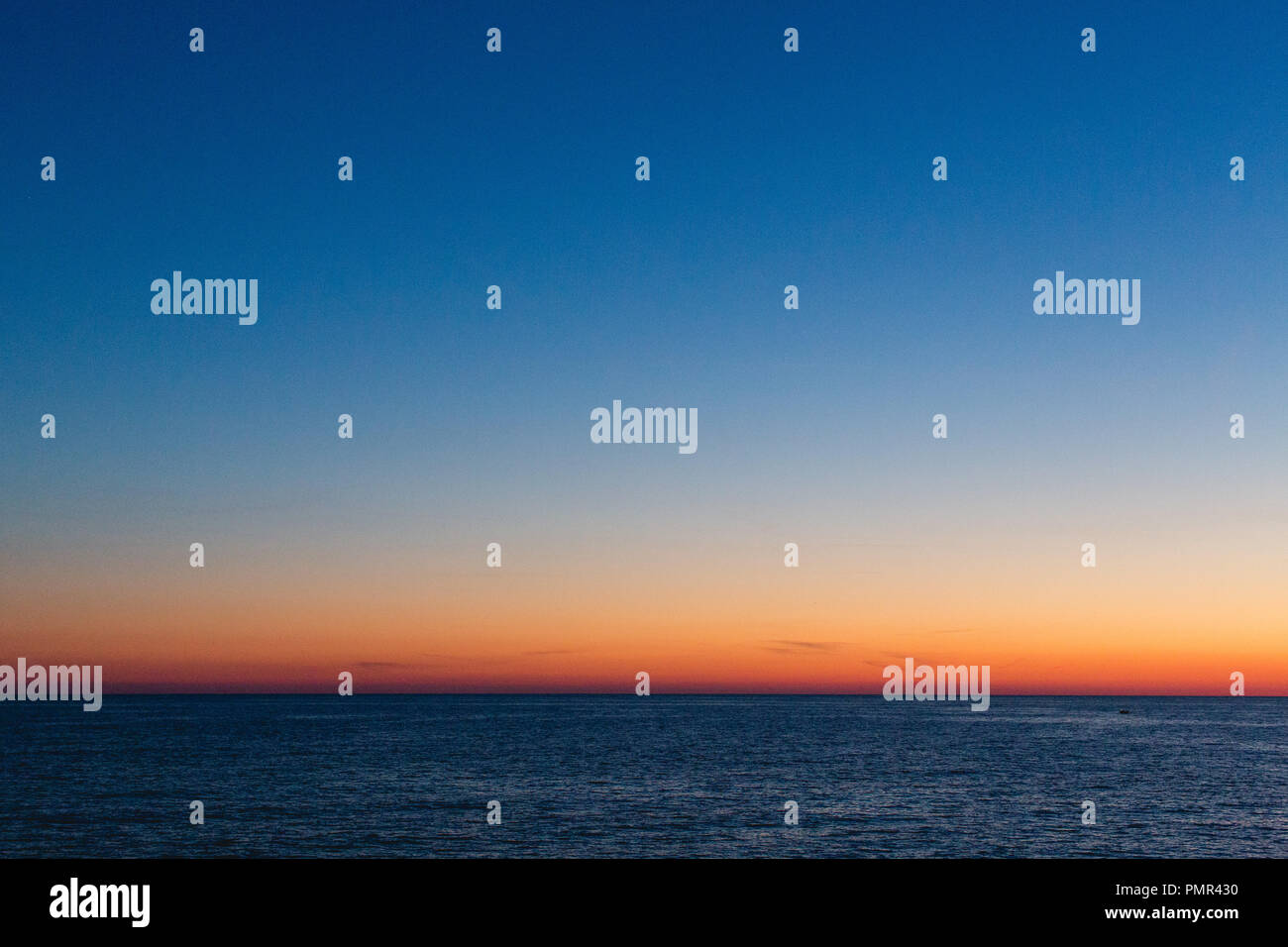 The glow of sunset after the sun has disappeared behind the horizon ...