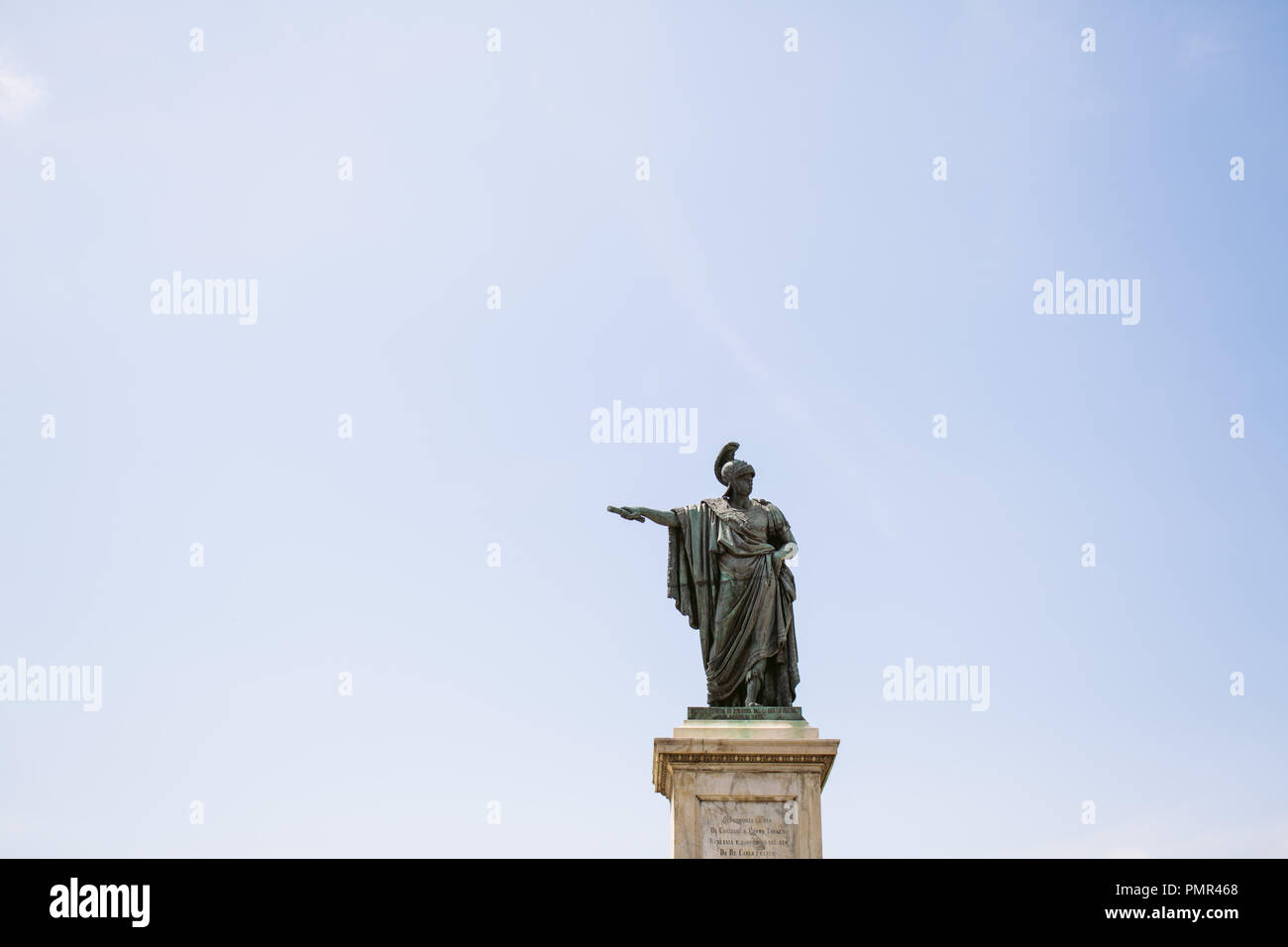 Statue of a Roman Centurion or Emperor holding a scroll and pointing to ...