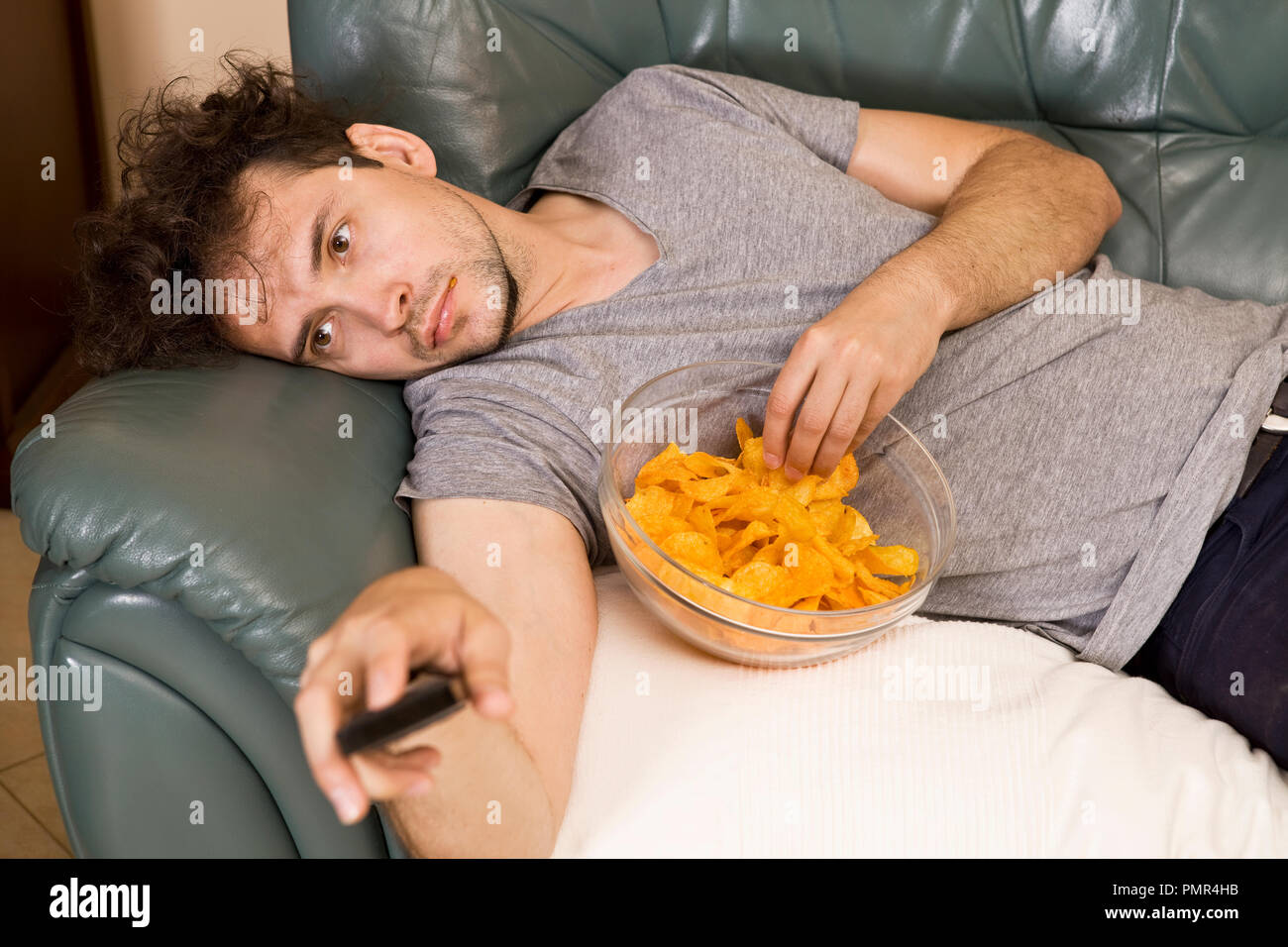 Lazy man hi-res stock photography and images - Alamy