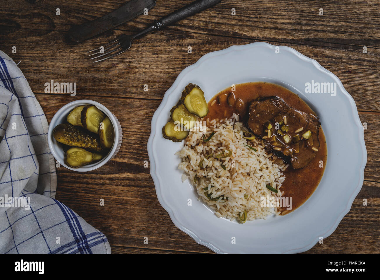 Czech traditional food Znojmo's sauce with gherkin and pork meat and ...