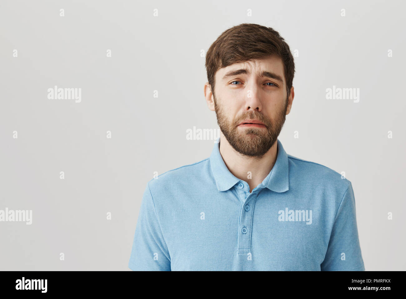 Person trying to hide face with hand hi-res stock photography and ...