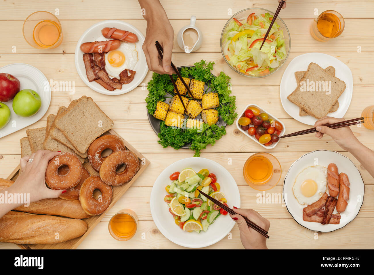 Four friends having dinner top hi-res stock photography and images - Alamy