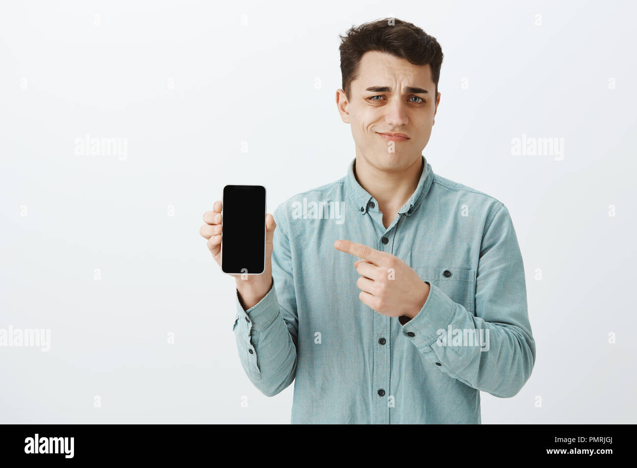Unimpressed man hi-res stock photography and images - Alamy