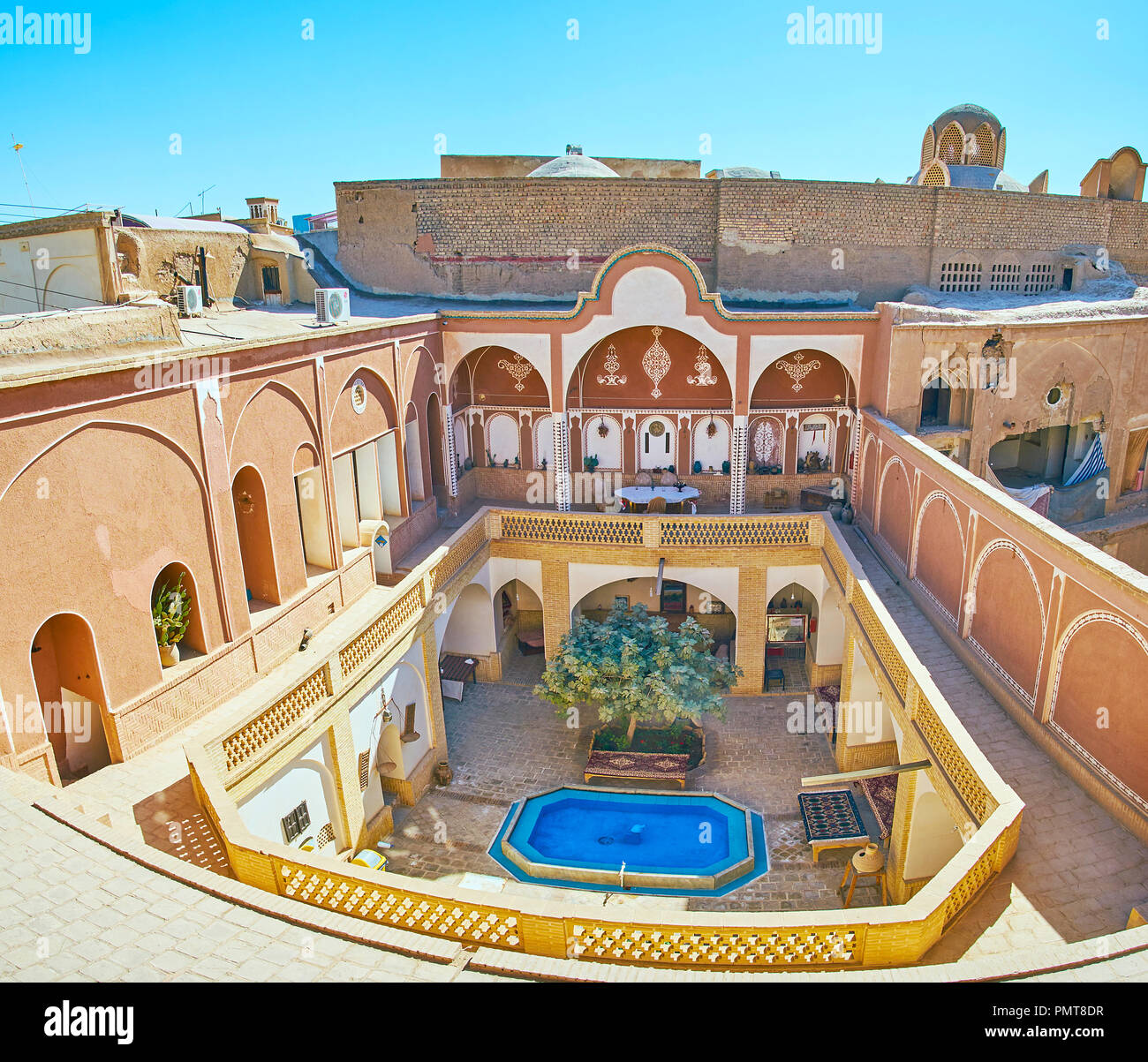 KASHAN, IRAN - OCTOBER 22, 2017: Multistory courtyard of traditional ...