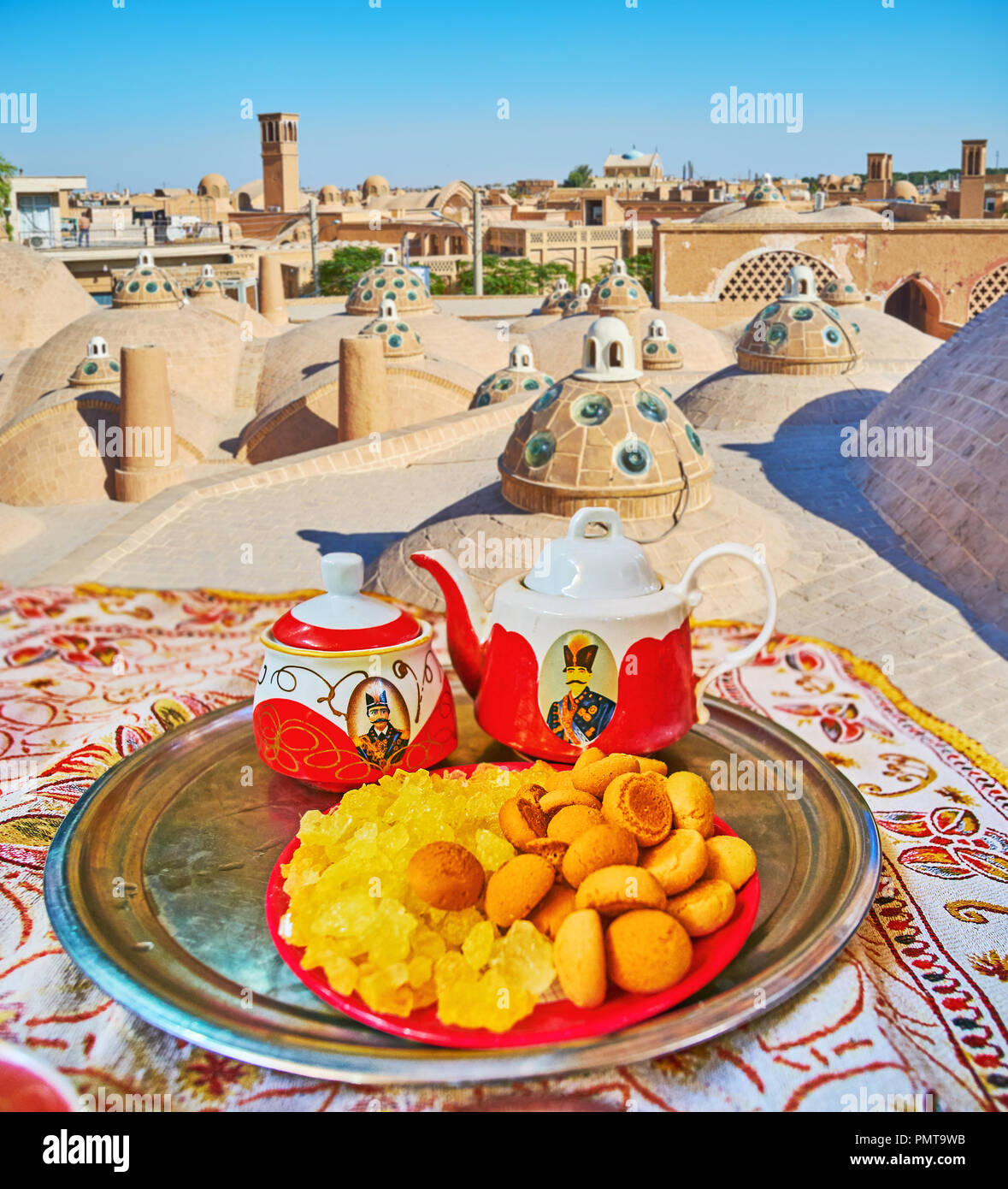 Traditional persian restaurant offers tasty tea with local sweets on ...