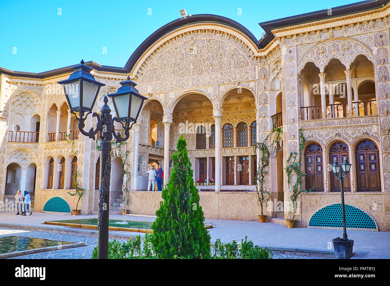KASHAN, IRAN - OCTOBER 22, 2017: The ornate portal of Tabatabaei House with fine carved stucco ...