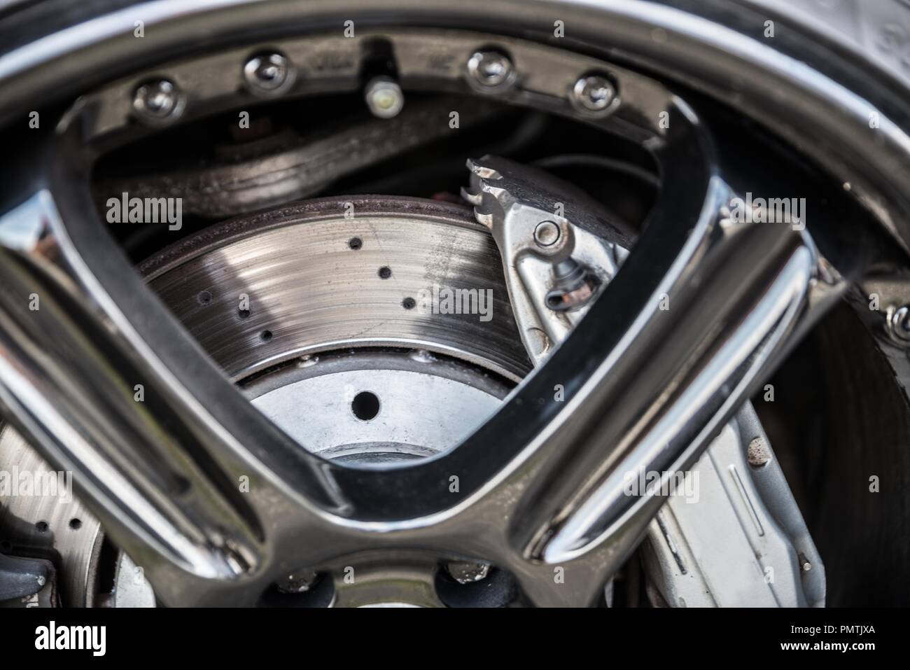 Sports car braking system. Disc brake and brake caliper Stock Photo - Alamy