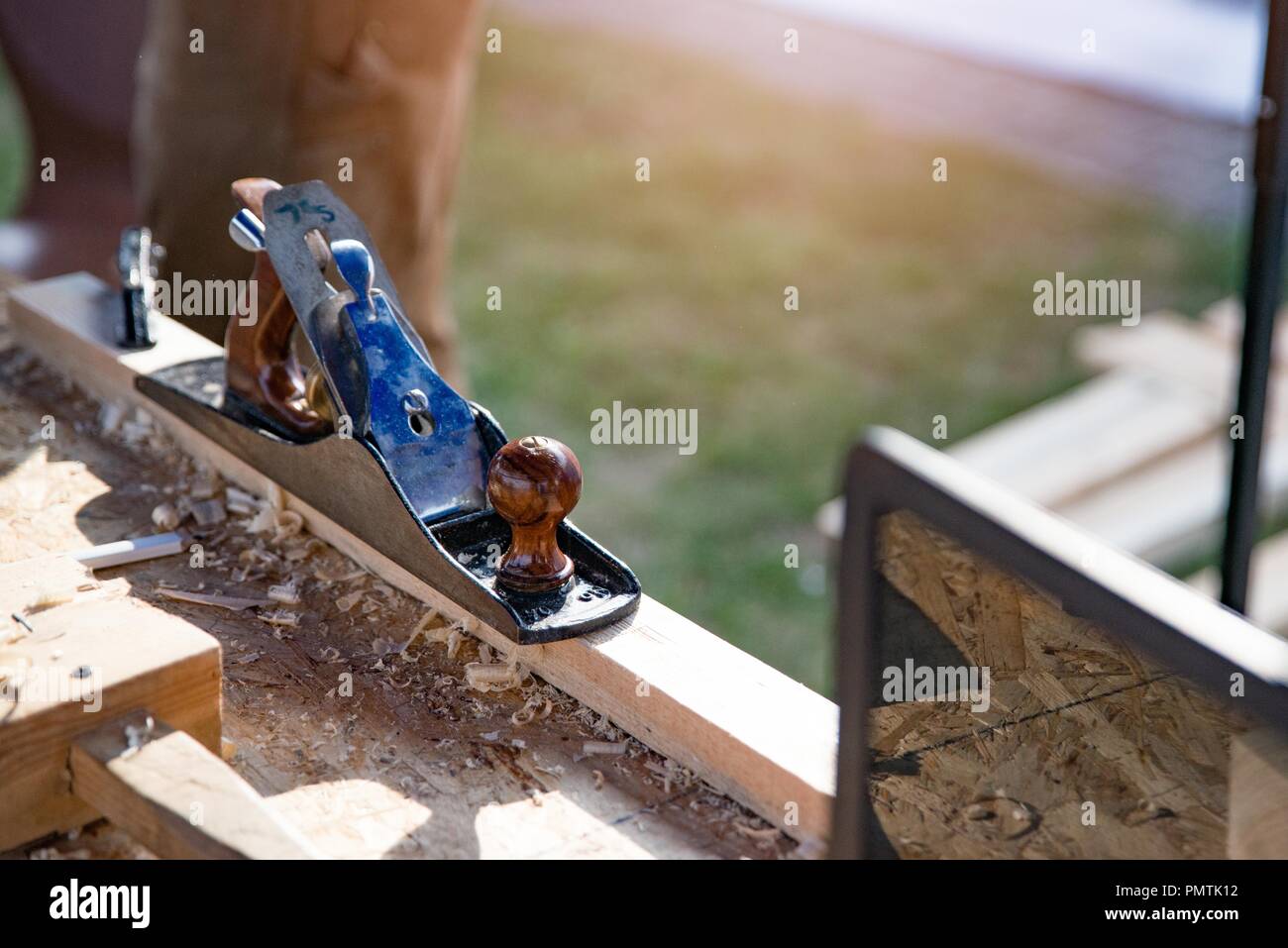 Woodworking carpenter's wood shaving plane and tools Stock Photo - Alamy