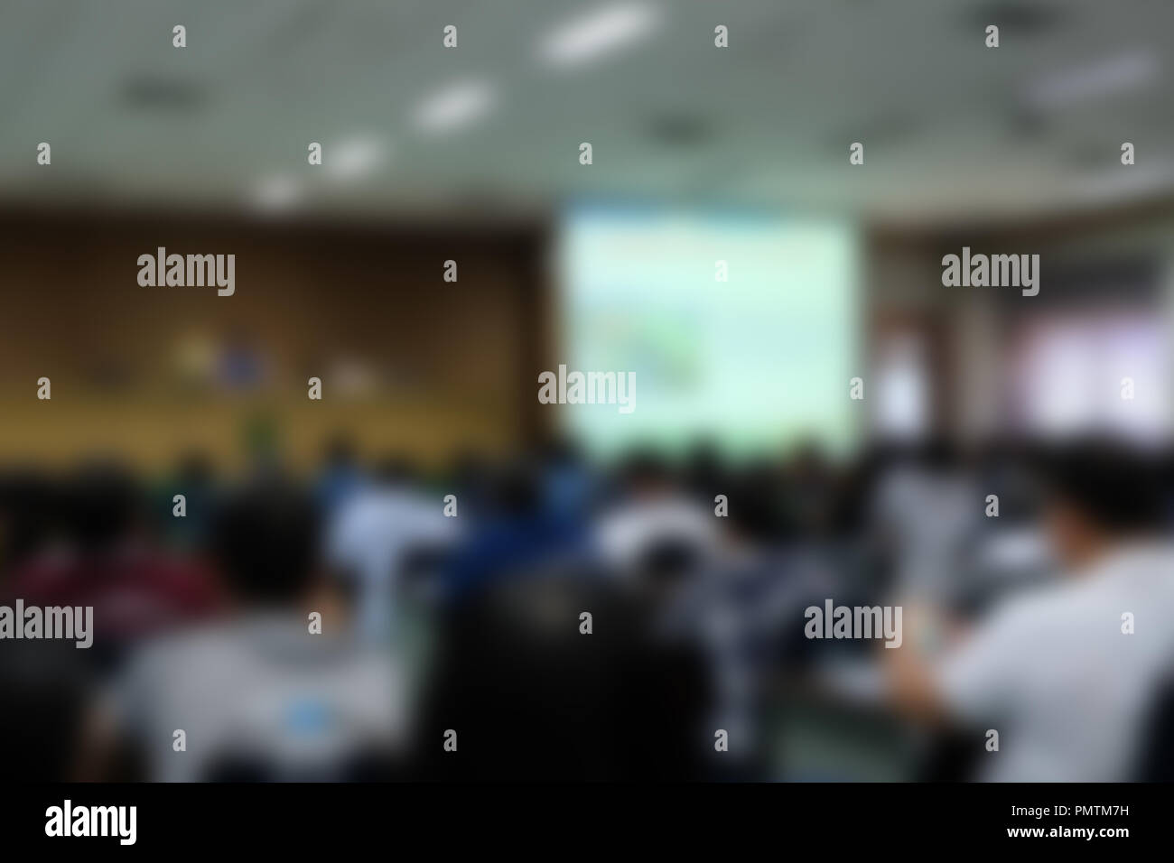 stage & presentation screen in seminar conference room. blur background ...