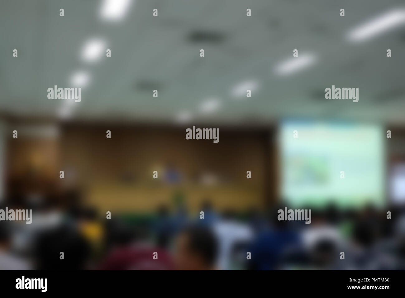 stage & presentation screen in seminar conference room. blur background ...