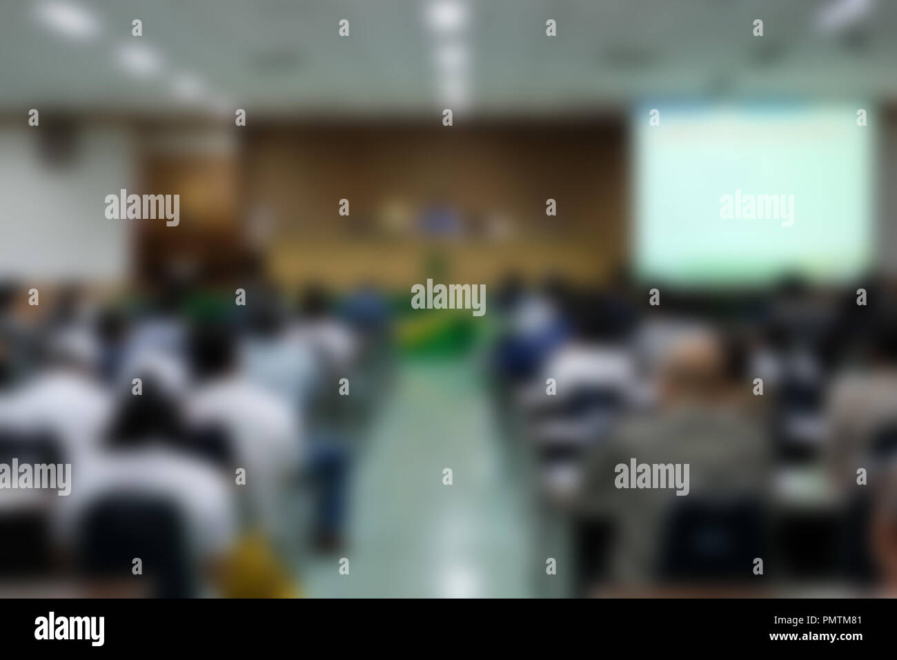 stage & presentation screen in seminar conference room. blur background ...