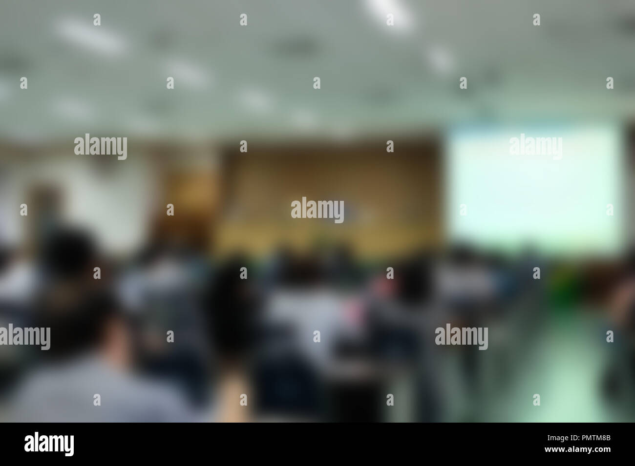 stage & presentation screen in seminar conference room. blur background ...