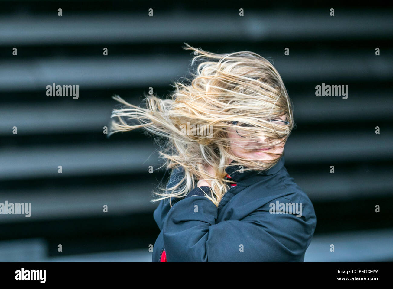 Hair blown in face by wind hi-res stock photography and images - Alamy