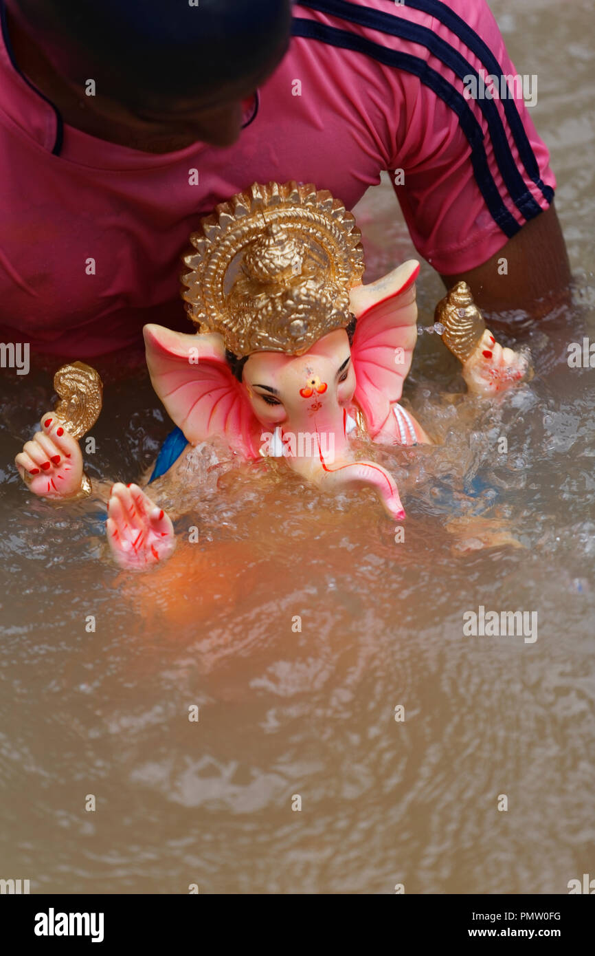 Ganapati idol water and immersion hi-res stock photography and images ...