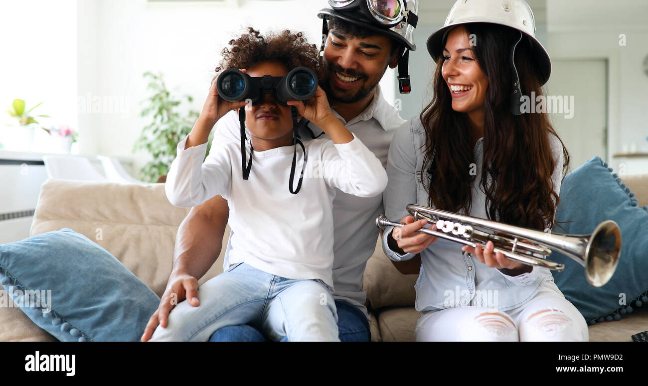 Picture of happy family having fun time together Stock Photo - Alamy