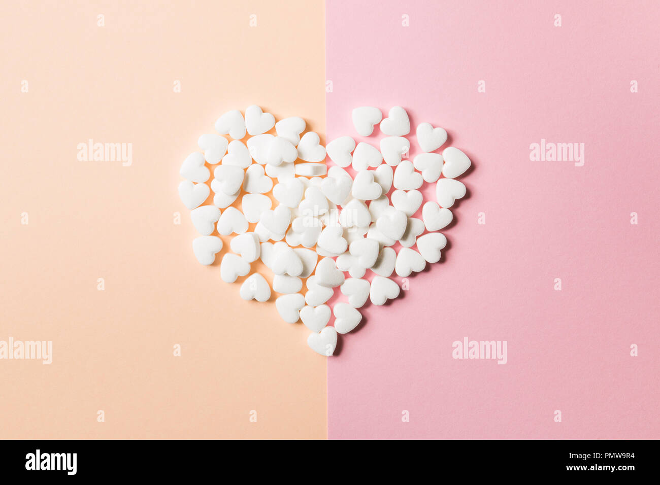 Pink tablets in form hi-res stock photography and images - Alamy